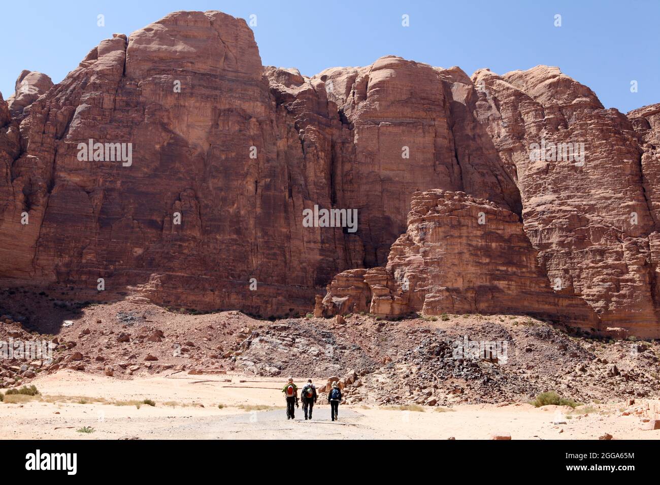 Hikers in Wadi Rum, Jordan Stock Photo - Alamy