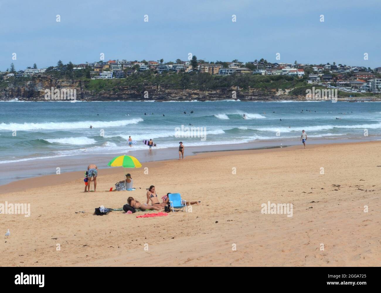 Relaxing under the sun, Aussie beach culture Stock Photo - Alamy
