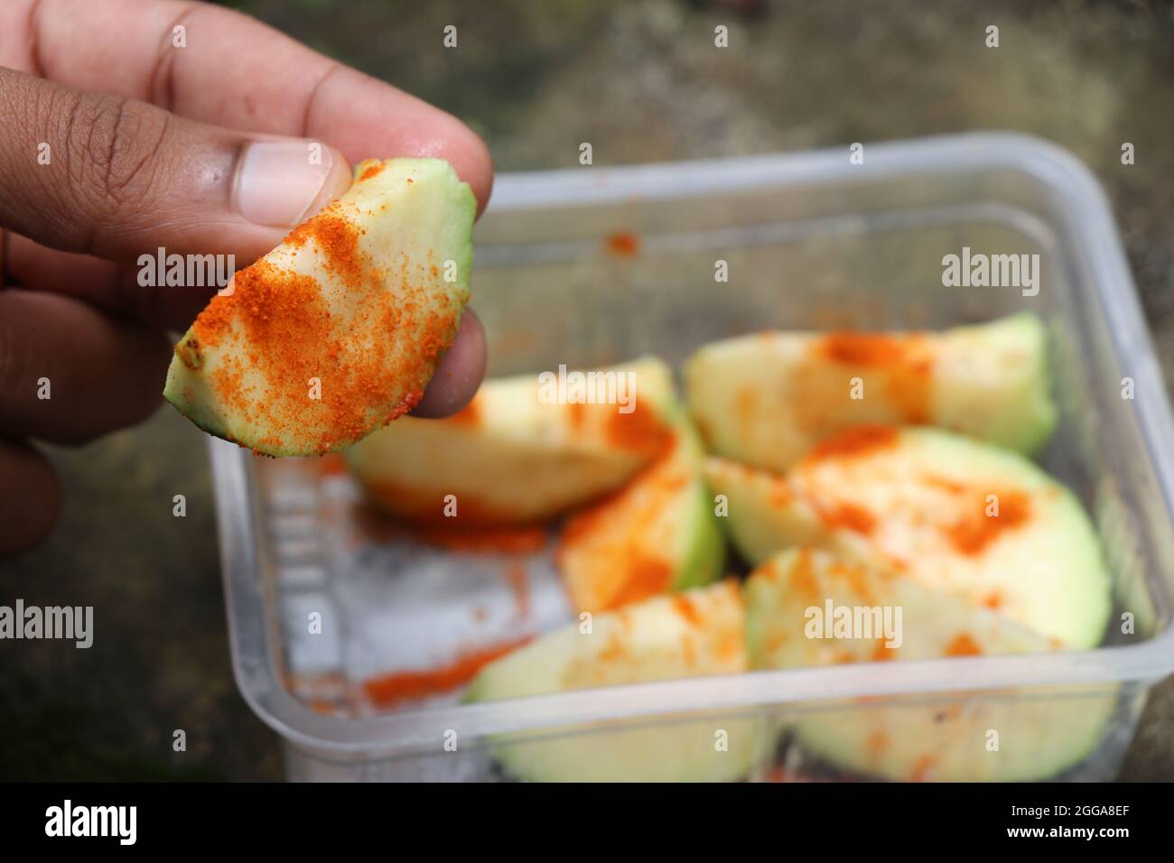 Guava pieces sprinkled with salt and red chilly powder, Spicy bowl of ...