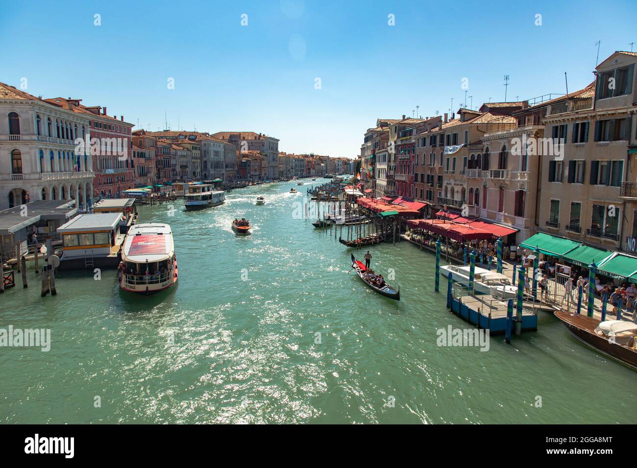 Grand Canal with tourists gondolas and boats from above -Venice, Italy ...