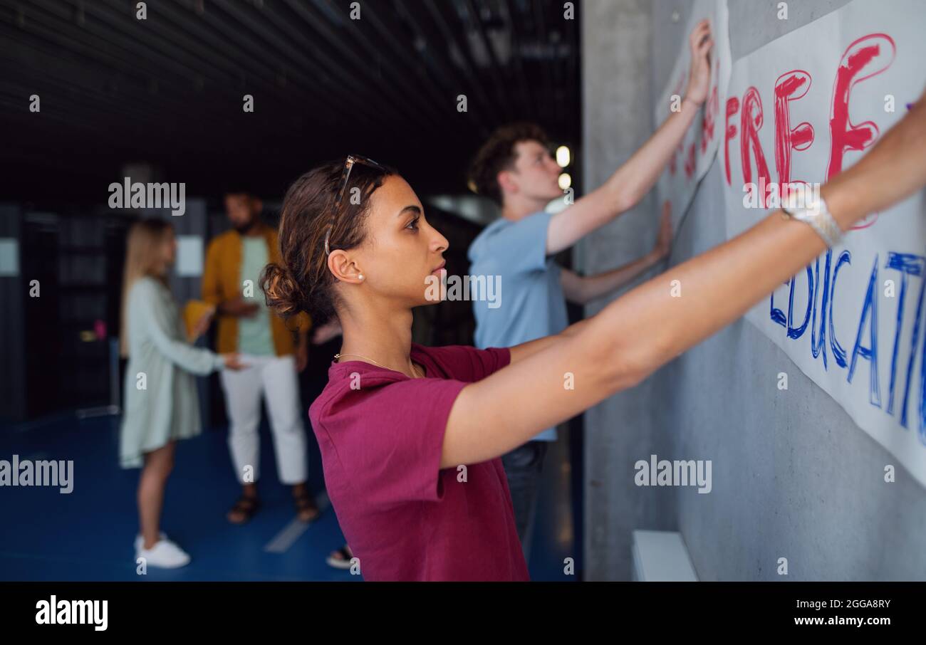 University students activists protesting indoors, fighting for free ...