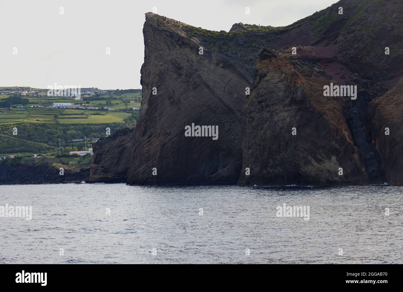 Cliff of the bay of Entre Morros, in the island of Sao Jorge, Azores ...