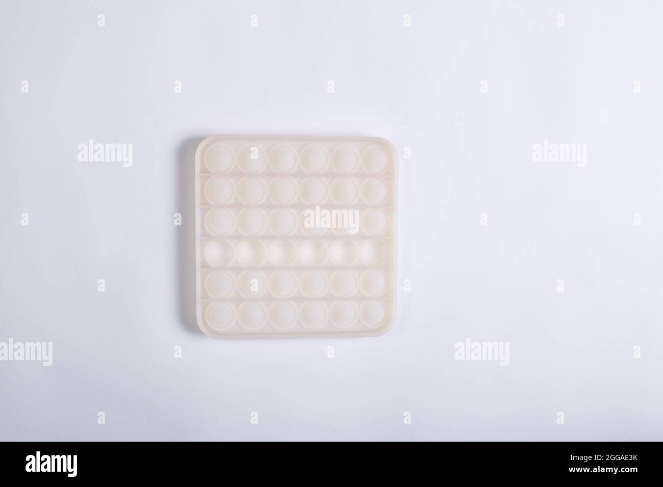 White pop it silicone toy on a white background with copy space Stock ...