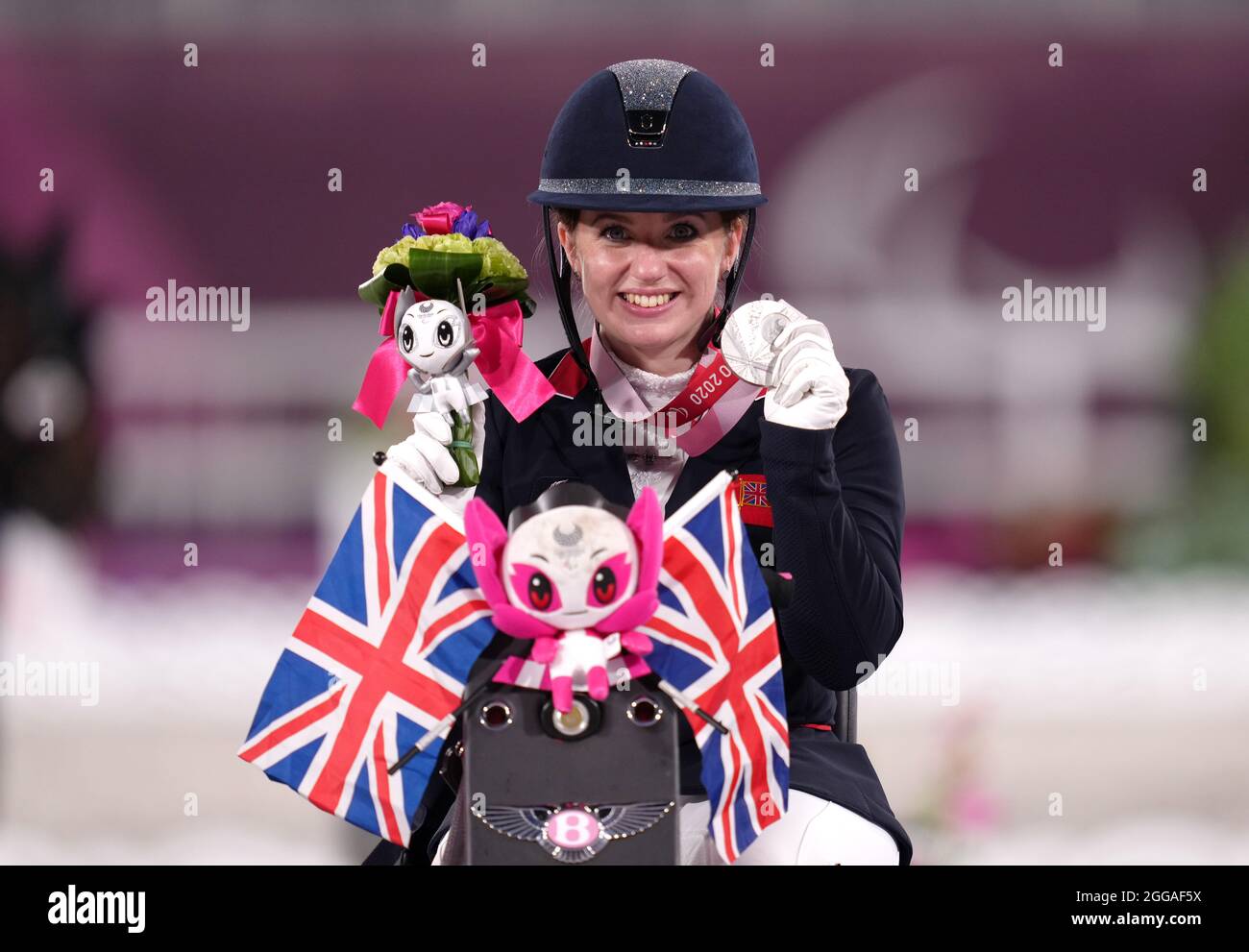 Great Britain's Natasha Baker celebrates with the silver medal in the ...