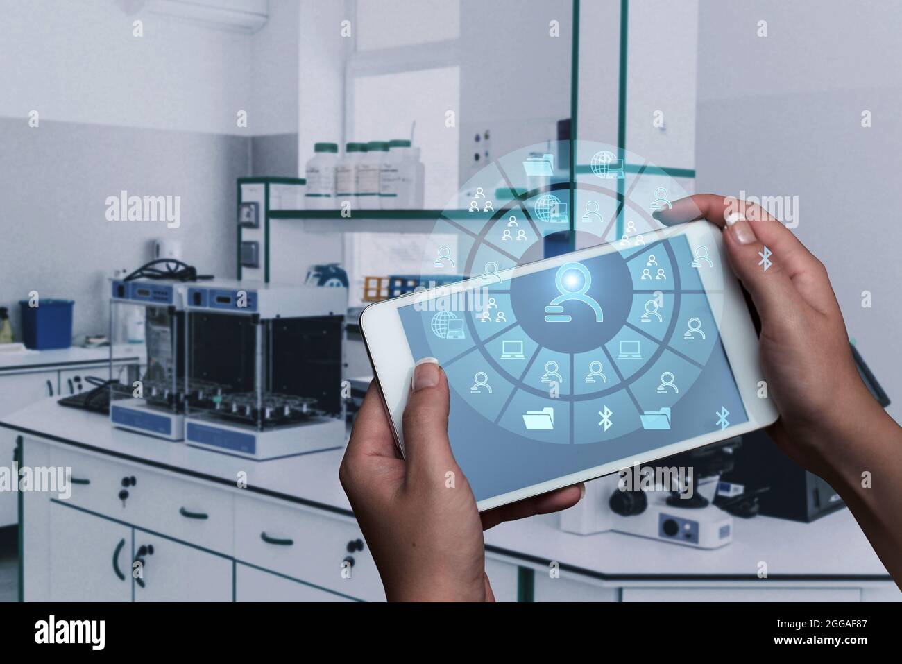 Both Hands Holding A Mobile Phone In Laboratory Showing Futuristic ...