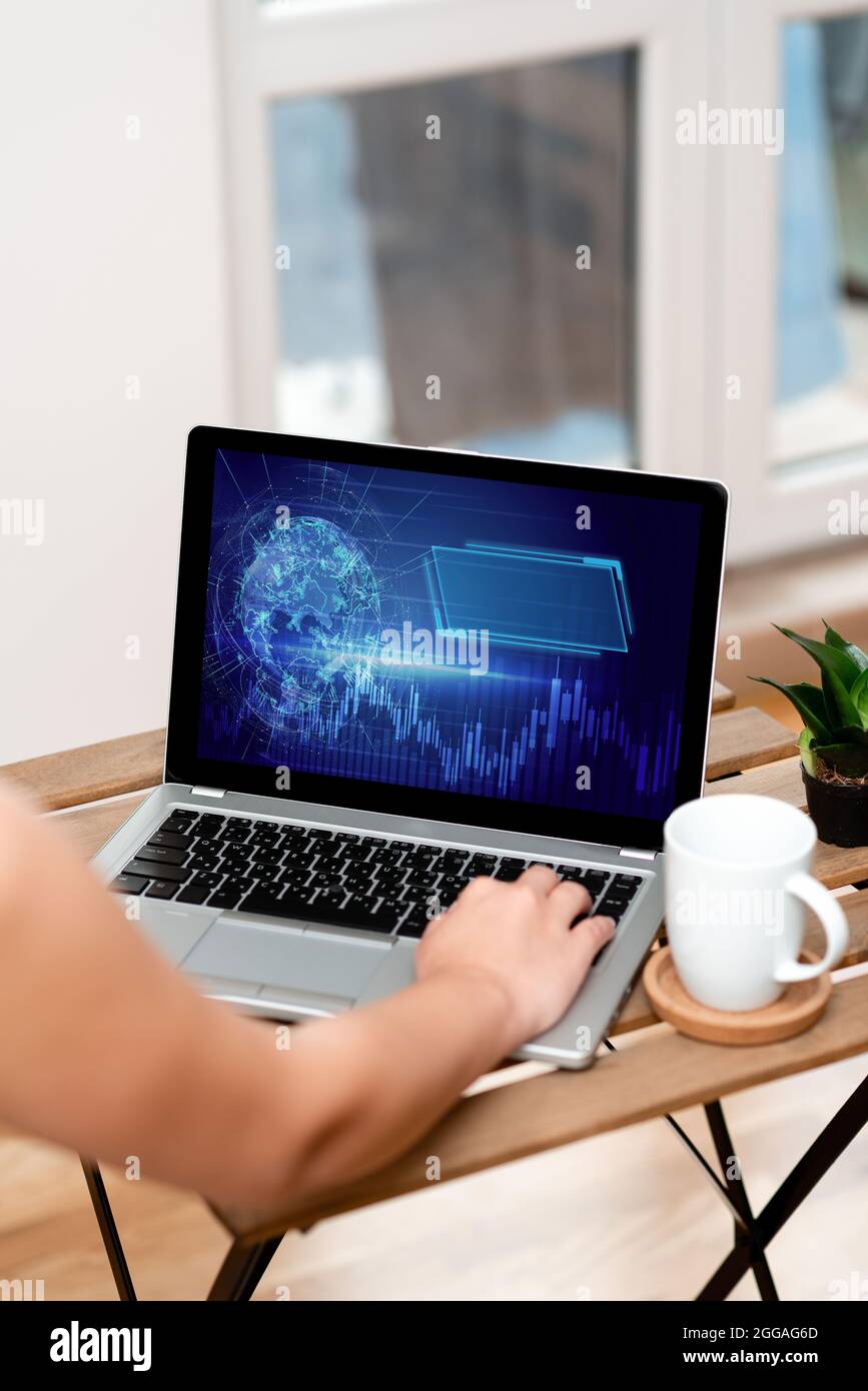 Hand Busy Typing On Laptop Beside Coffe Mug And Plant Accomplishing ...