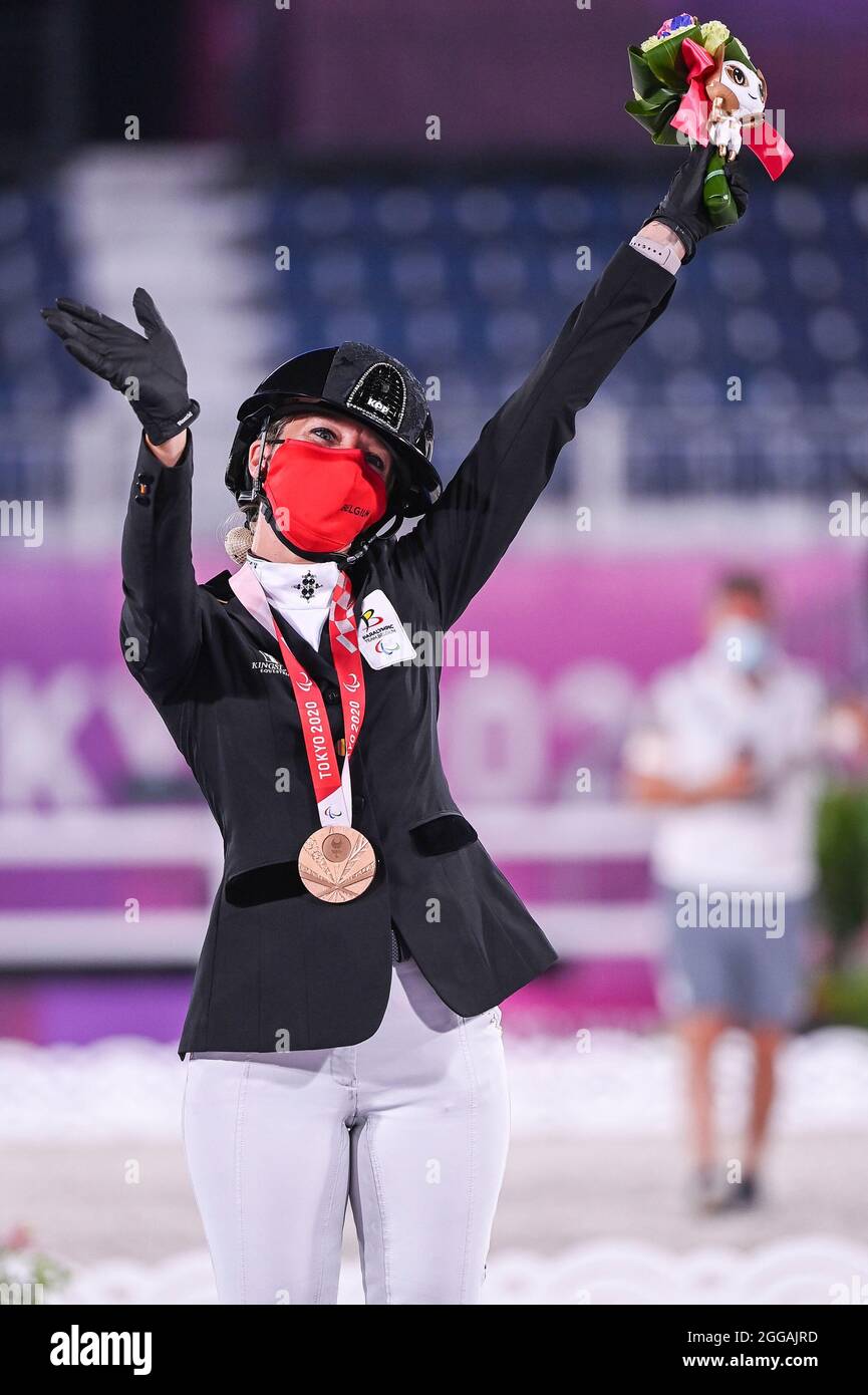 Paralympic jockey Manon Claeys celebrates after winning the bronze ...