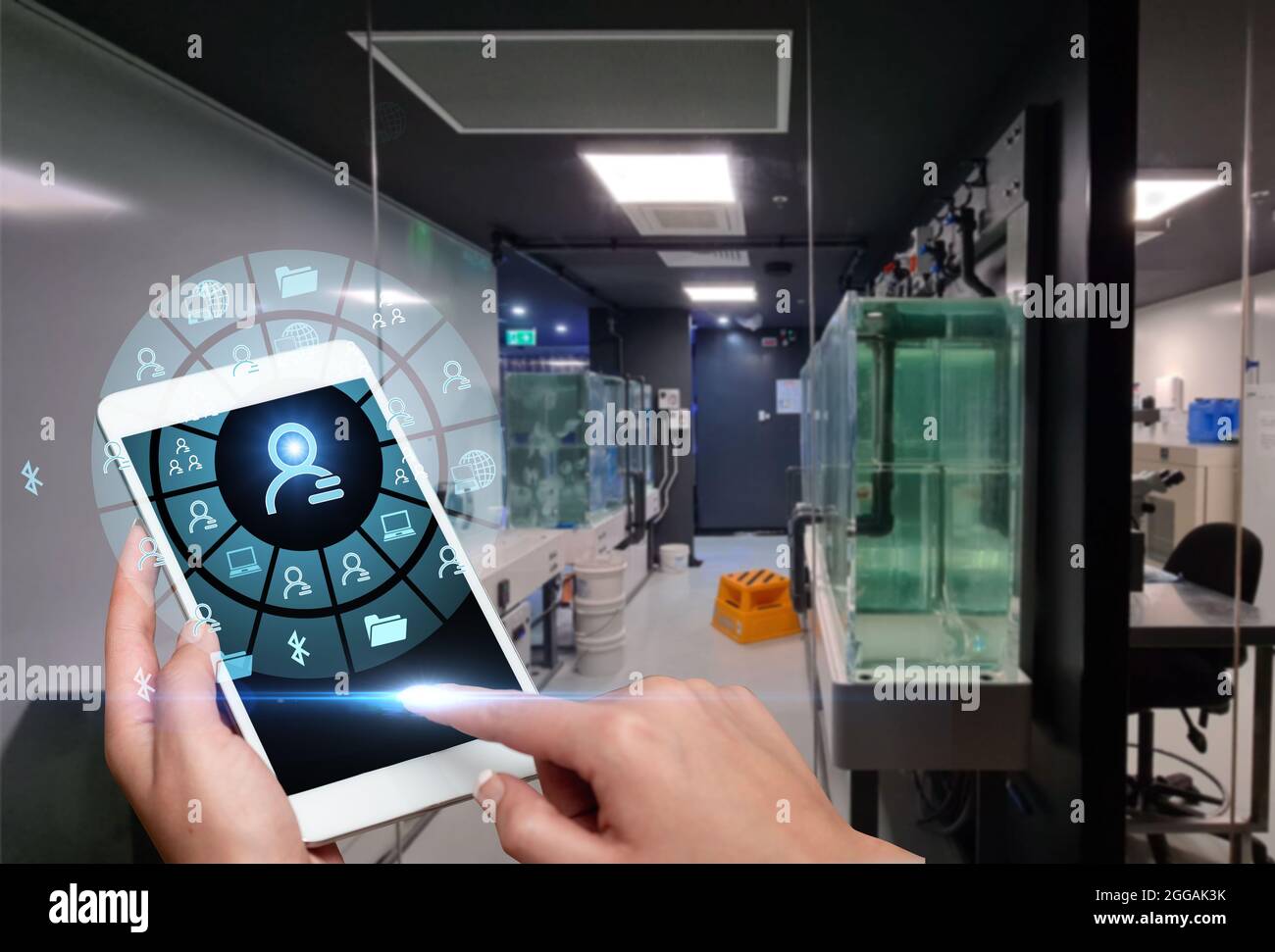 Hand Touching Screen Of Mobile Phone In Laboratory Showing Futuristic ...