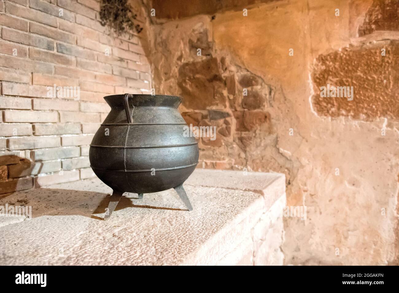 Ancient iron cauldron hi-res stock photography and images - Alamy
