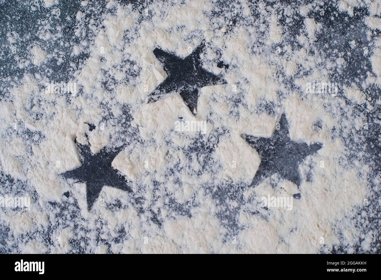 Closeup of star shapes in flour. Top view Stock Photo - Alamy