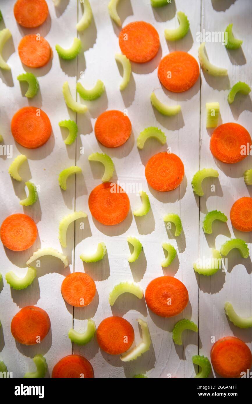 Presentation of vegetables celery and carrots cut into small slices ...