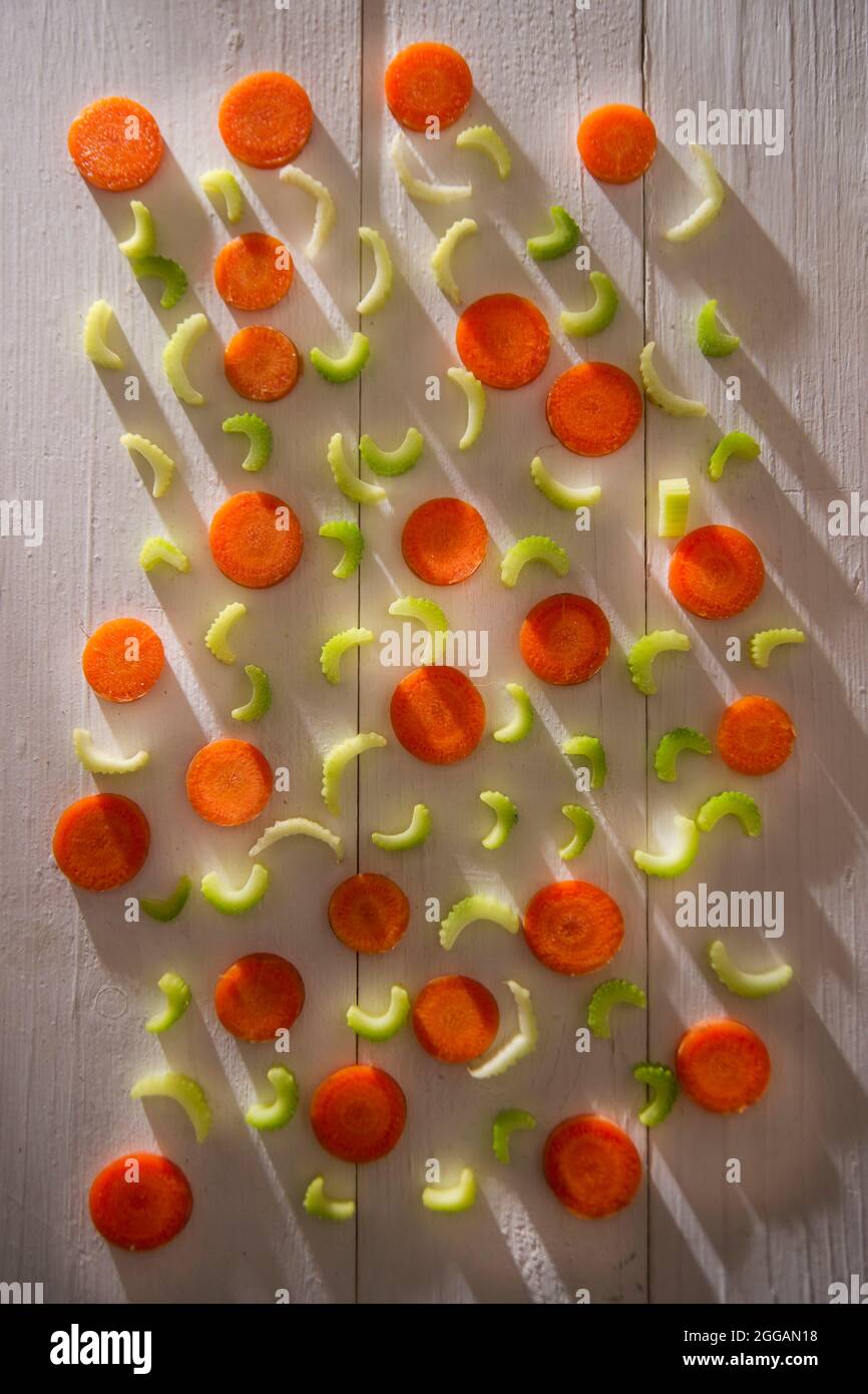 Presentation of vegetables celery and carrots cut into small slices ...