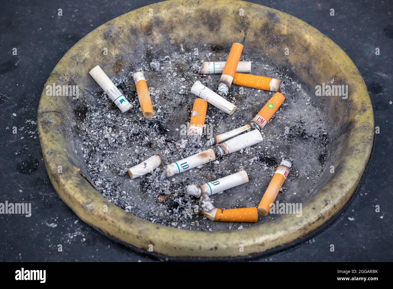 Sentosa, Singapore - March 2, 2021 - Closeup of a public ash tray in ...