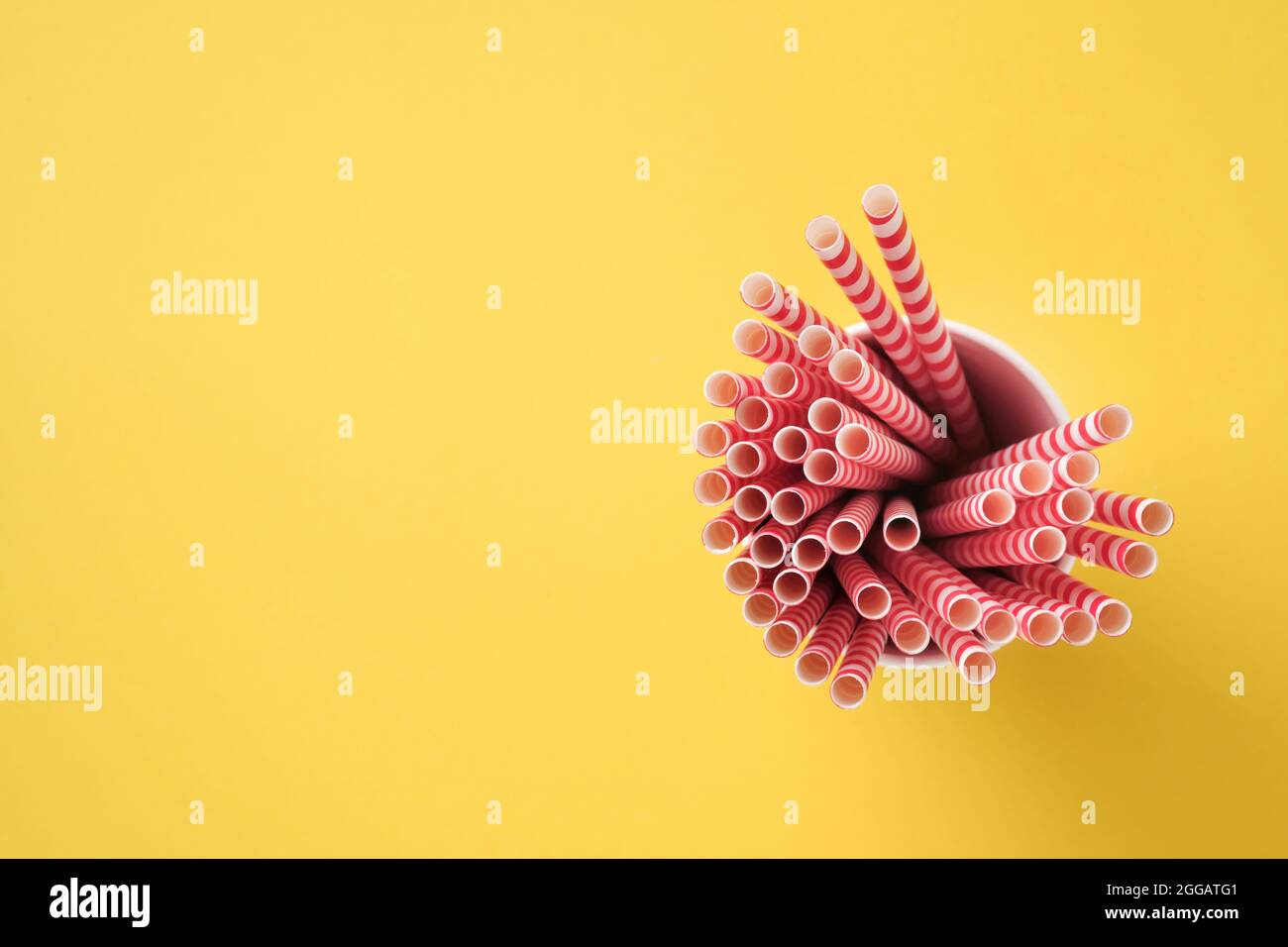 Drinking tubes red and brown made of paper and cornstarch ...