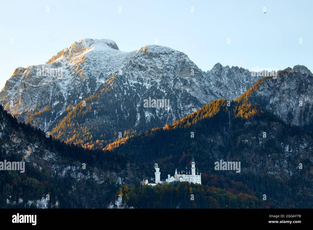 old white fairy tale castle in a mountain landscape Stock Photo - Alamy