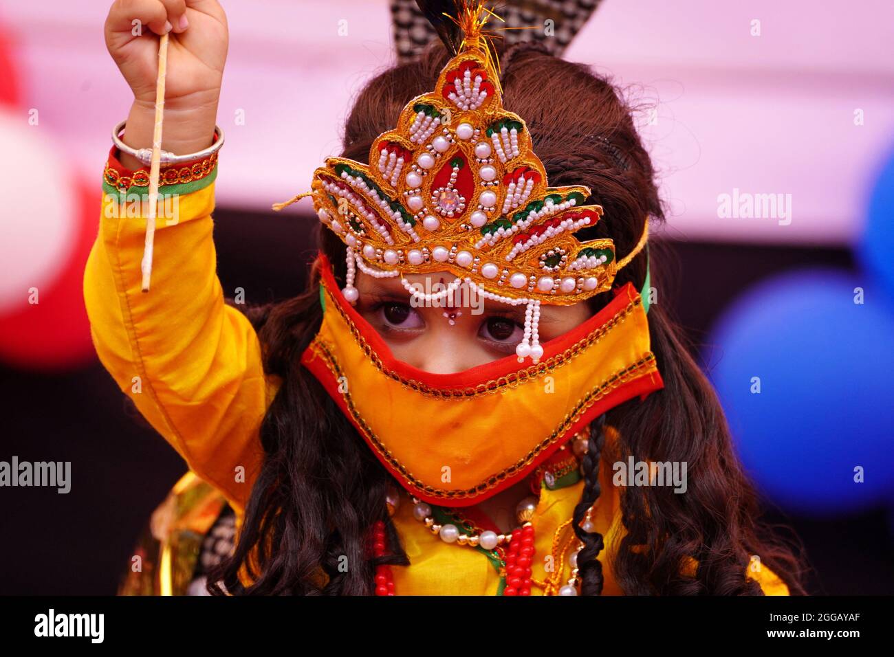 Indian Child wear face mask, Dressed As Hindu Lord Krishna, During The ...