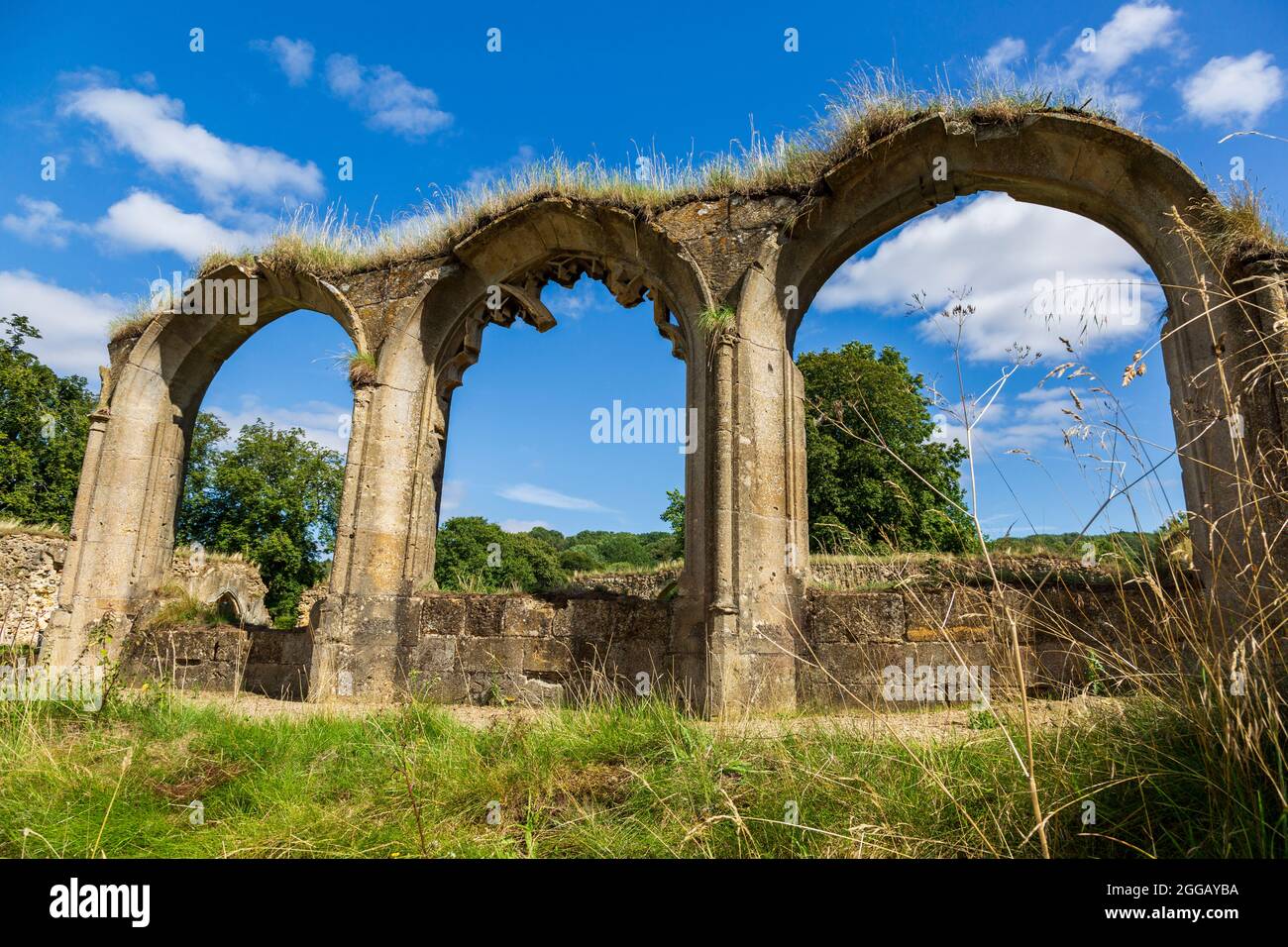 The ruined arches of the Cloisters at Hailes Abbey, Gloucestershire ...