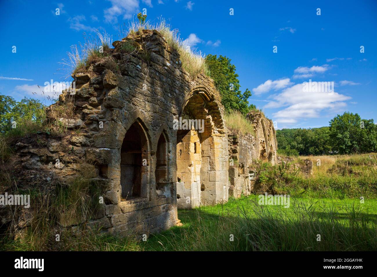 The ruined arches of the Cloisters at Hailes Abbey, Gloucestershire ...