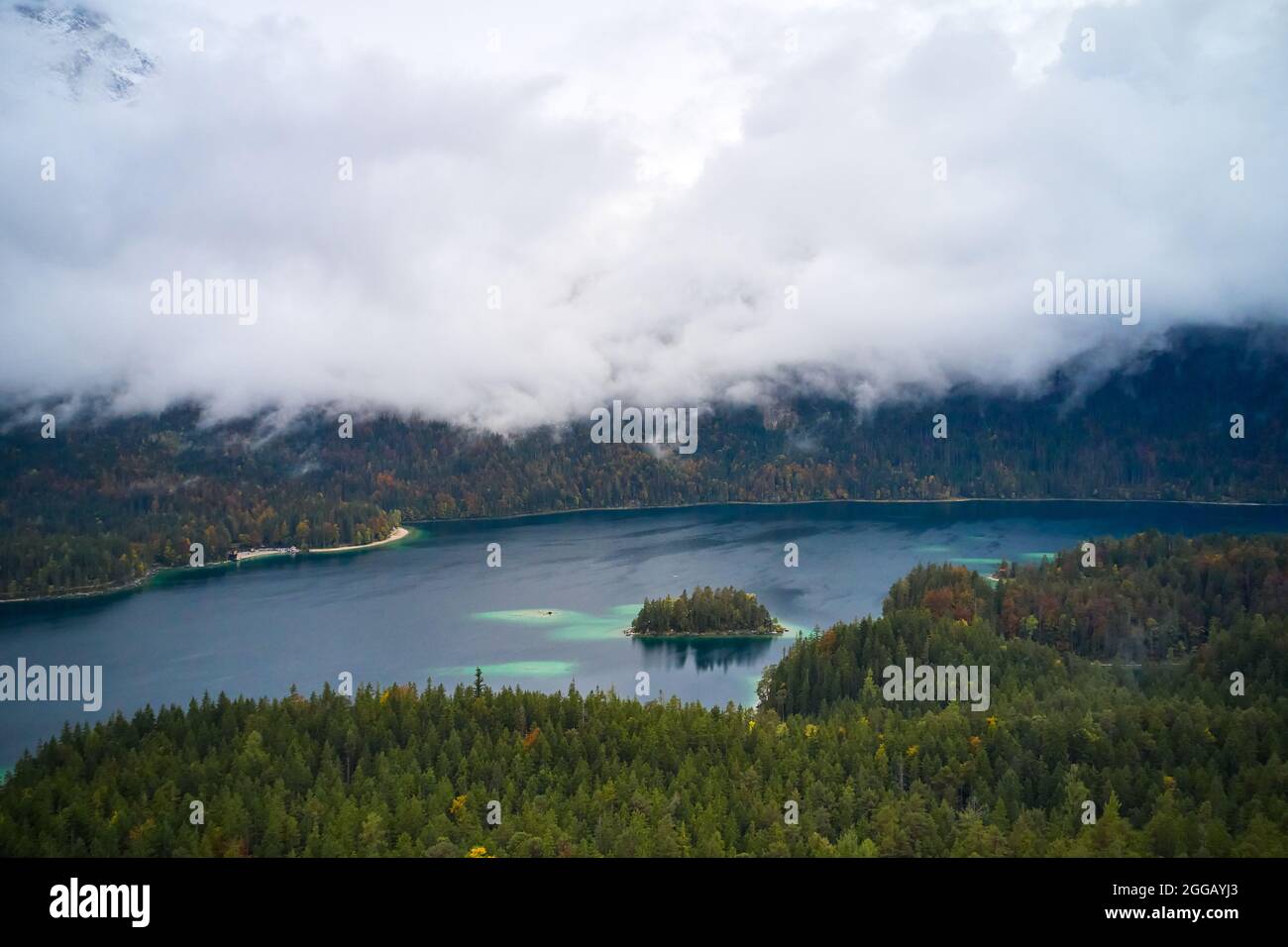 top view of nature landscape of beautiful forest and clear blue lake ...
