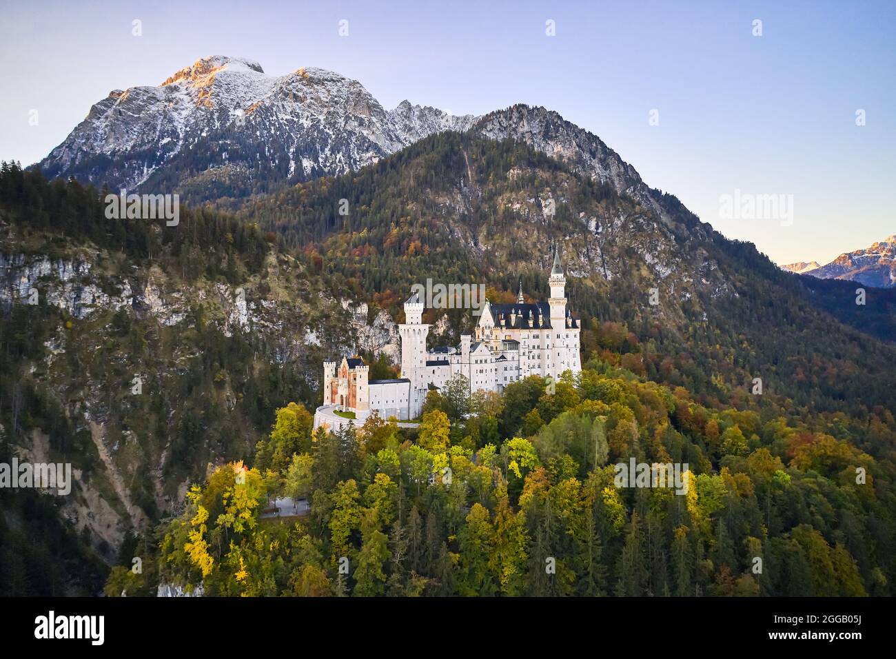 old white fairy tale castle in a mountain landscape Stock Photo - Alamy