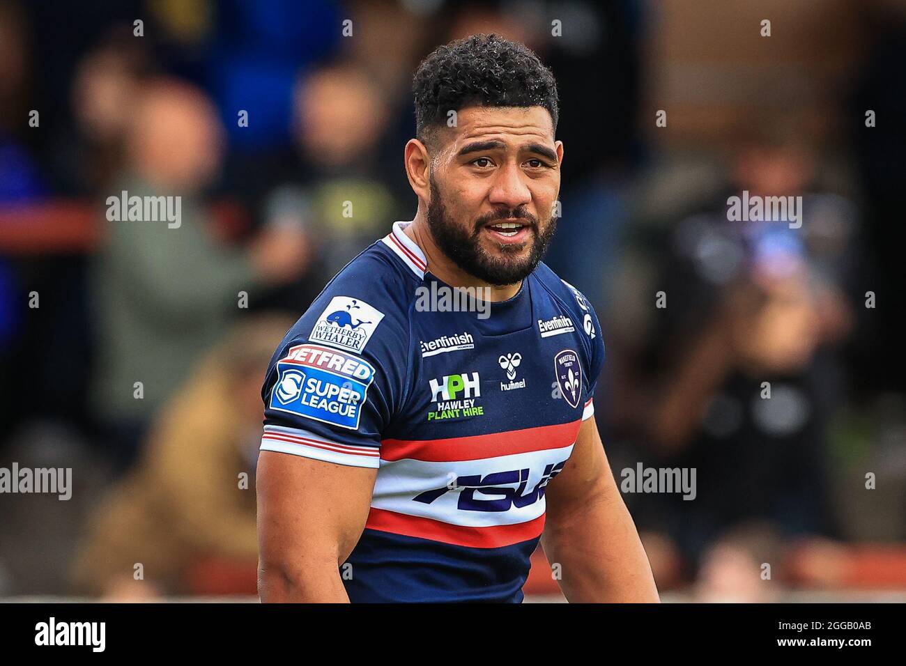 Kelepi Tanginoa (12) of Wakefield Trinity gives his team instructions ...