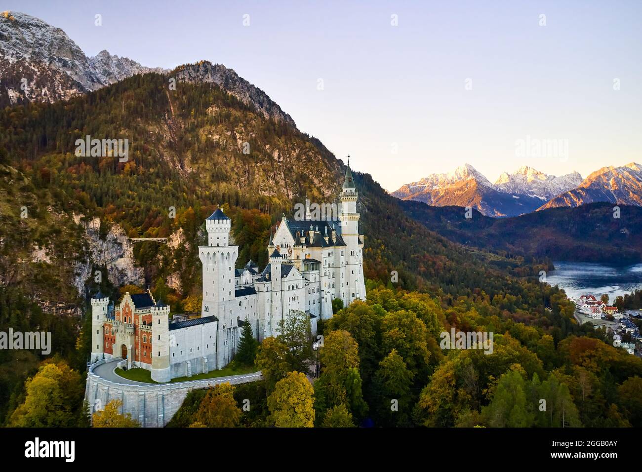 old white fairy tale castle in a mountain landscape Stock Photo - Alamy