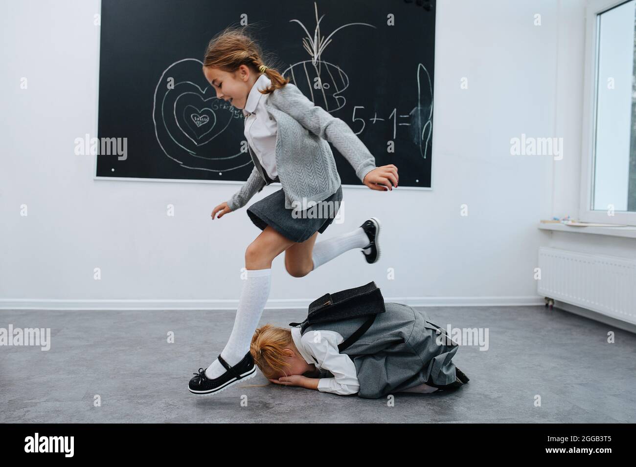Schoolgirl uniform floor hi-res stock photography and images - Alamy