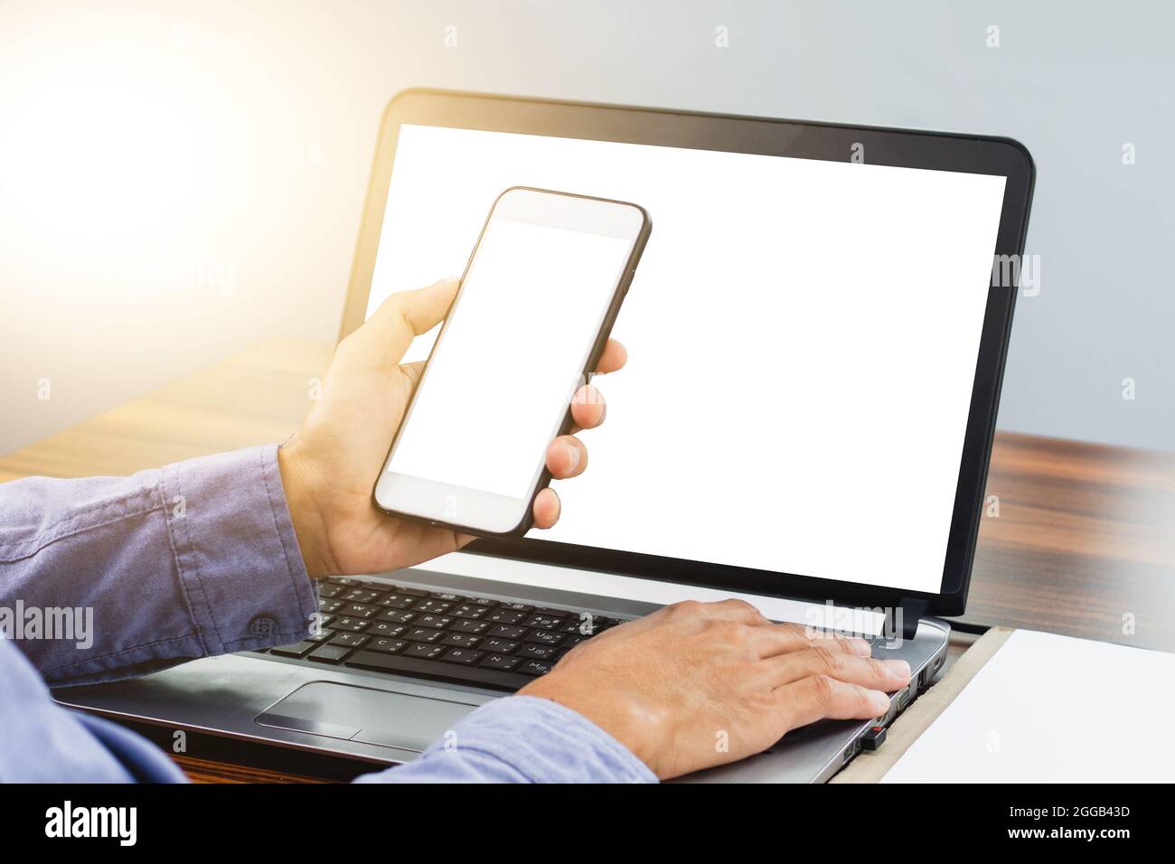 Hand using smartphone mobile internet technology work in office Stock ...