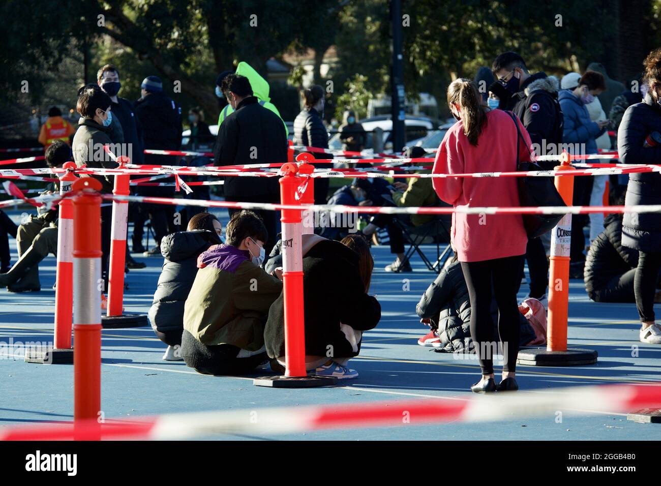 MELBOURNE, AUSTRALIA - Aug 28, 2021: Long queues of young people lining ...