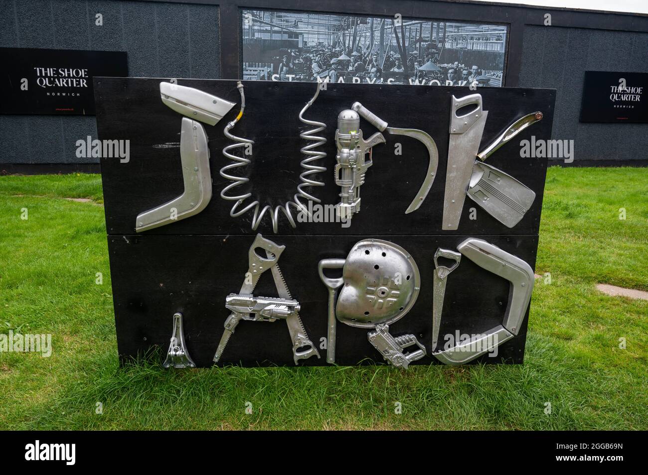 Junkyard sign made out of many different hand tools all sprayed silver ...
