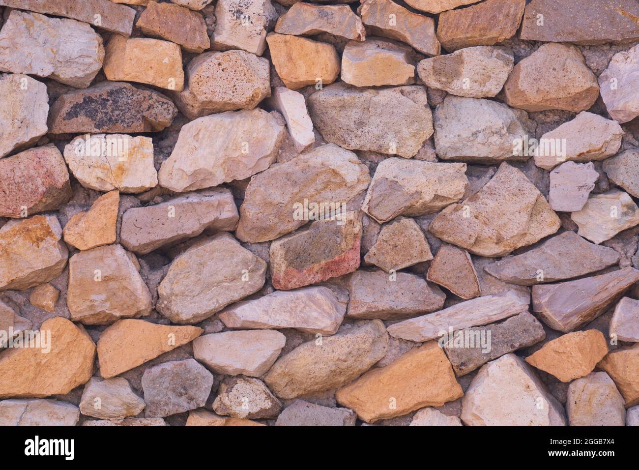 Stone wall to use as background or texture Stock Photo - Alamy