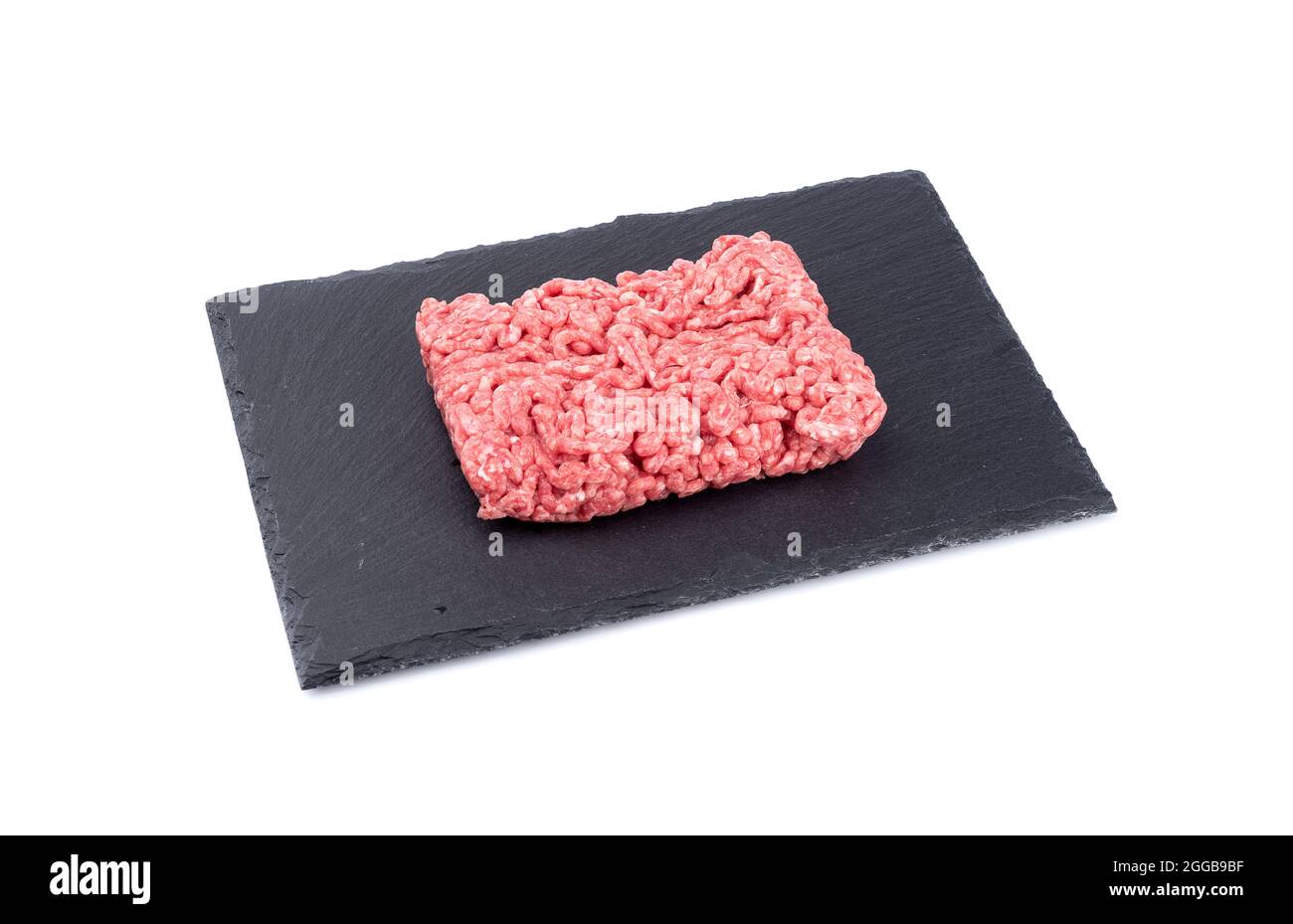 Stone slate board for serving with ground beef isolated on white ...