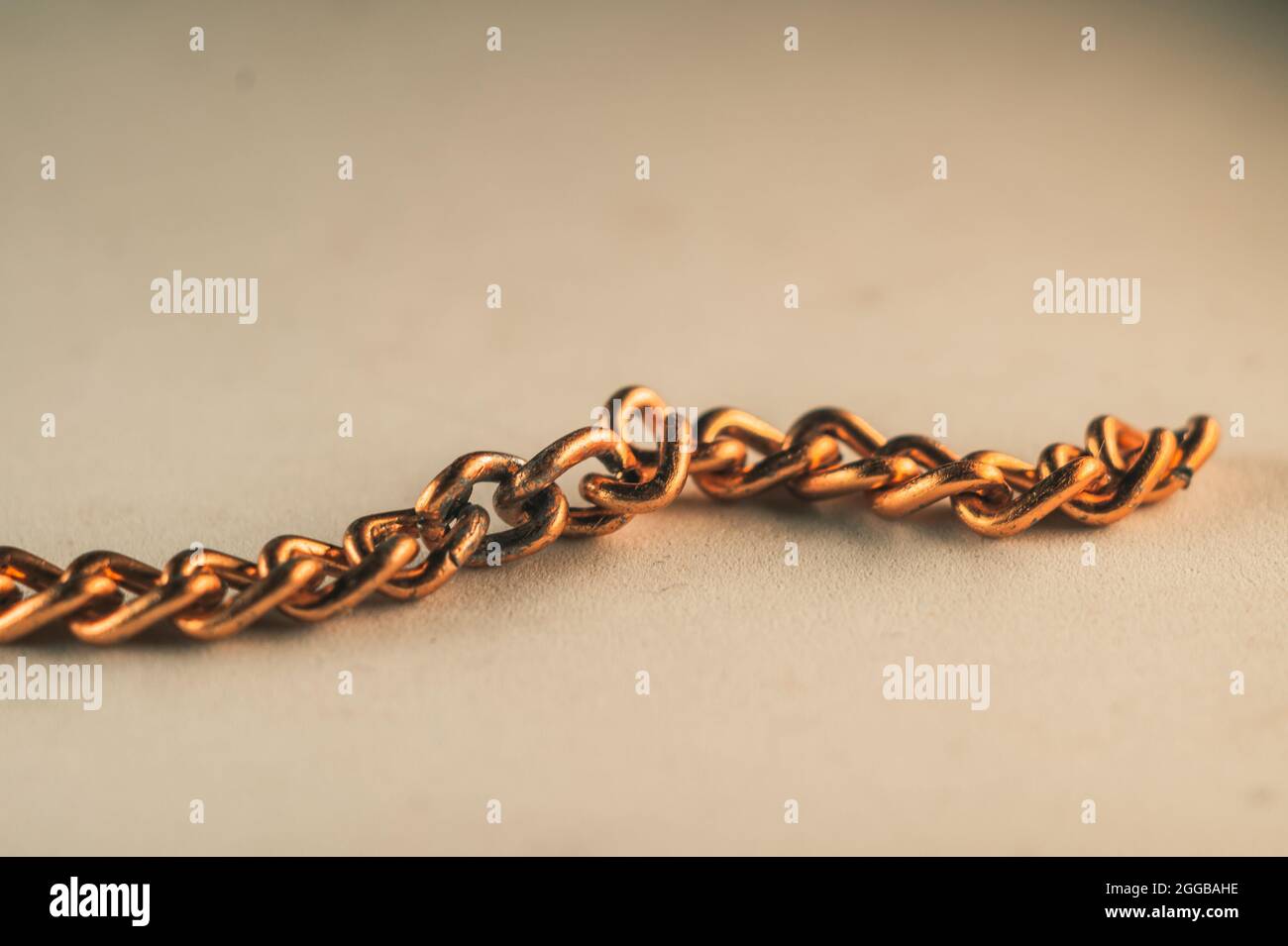 Broken chain gold hi-res stock photography and images - Alamy