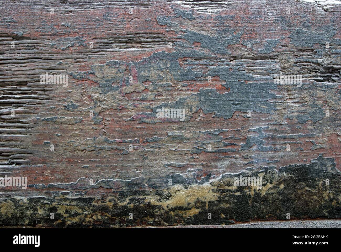 View of an old rusty brick stony wall with destroyed red painting Stock ...