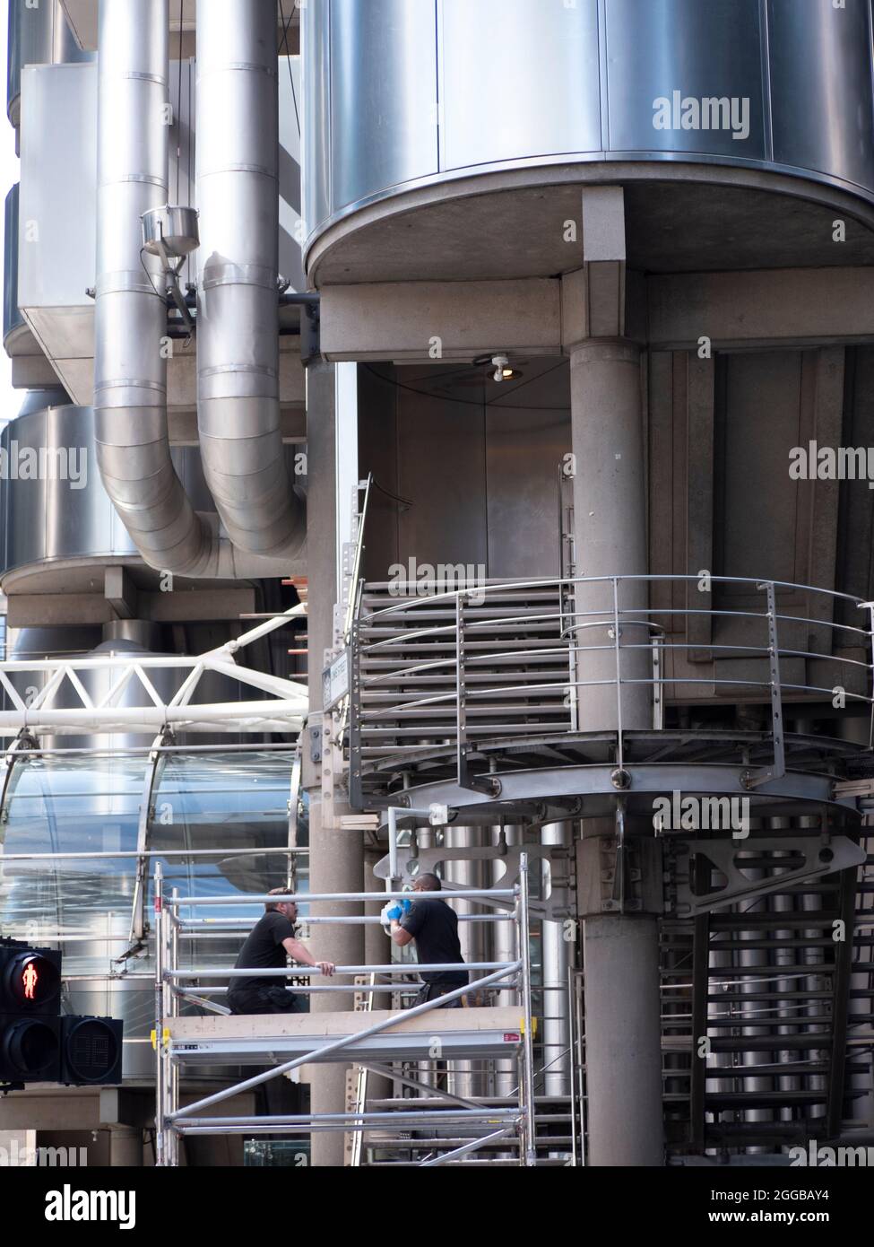 Engineers on scaffolding fitting security cameras to LLoyds building ...