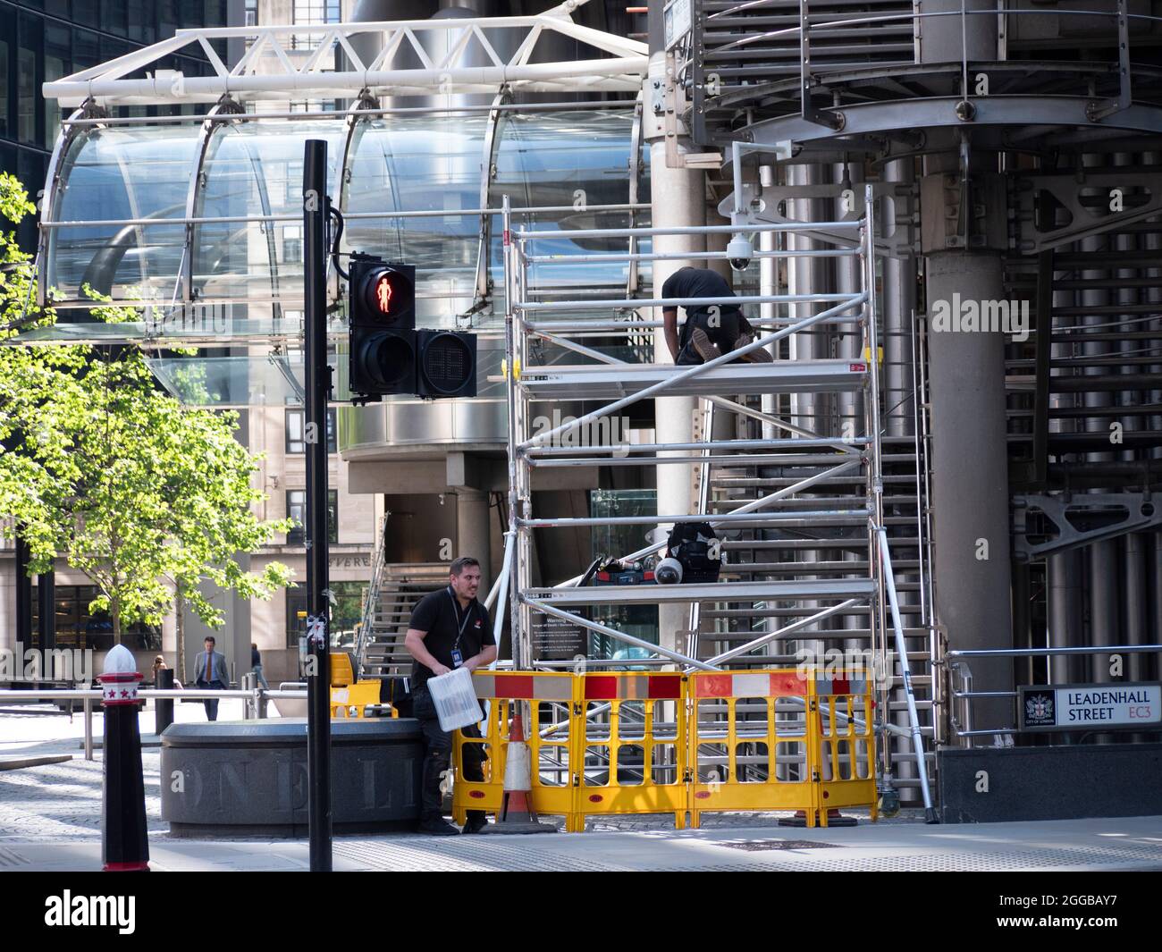 Engineers on scaffolding fitting security cameras to LLoyds building ...