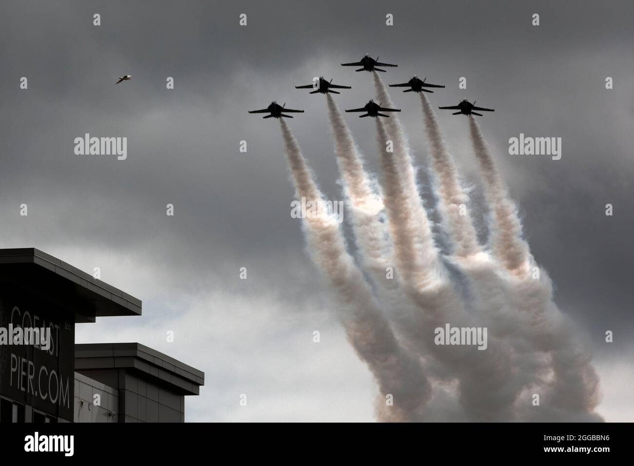 The U.S. Navy Blue Angels flying in formation over Boston Massachusetts ...