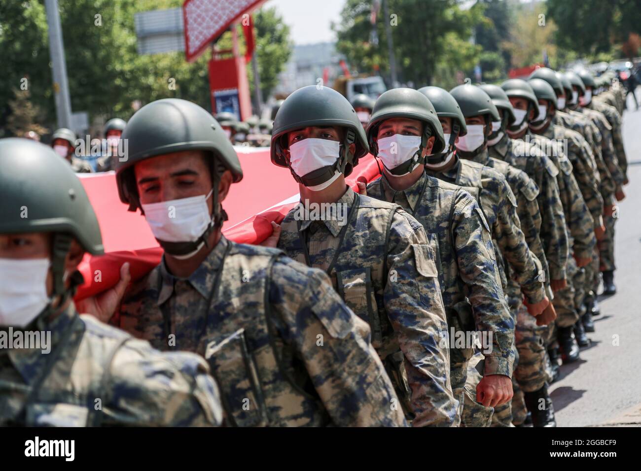 Turkish soldiers march during the military parade.Victory Day is an ...