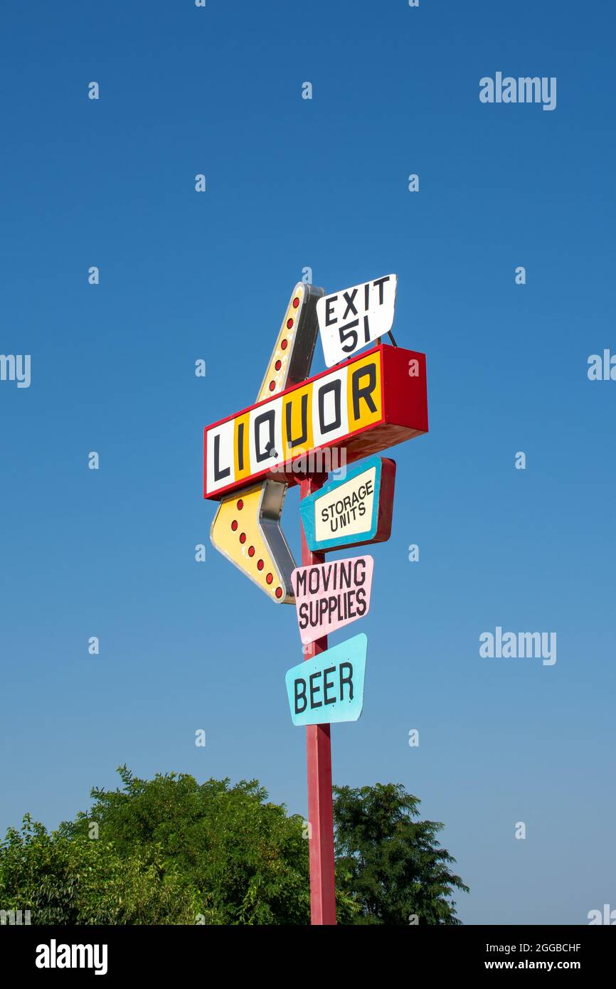 Vintage colorful retro roadside liquor sign Stock Photo - Alamy