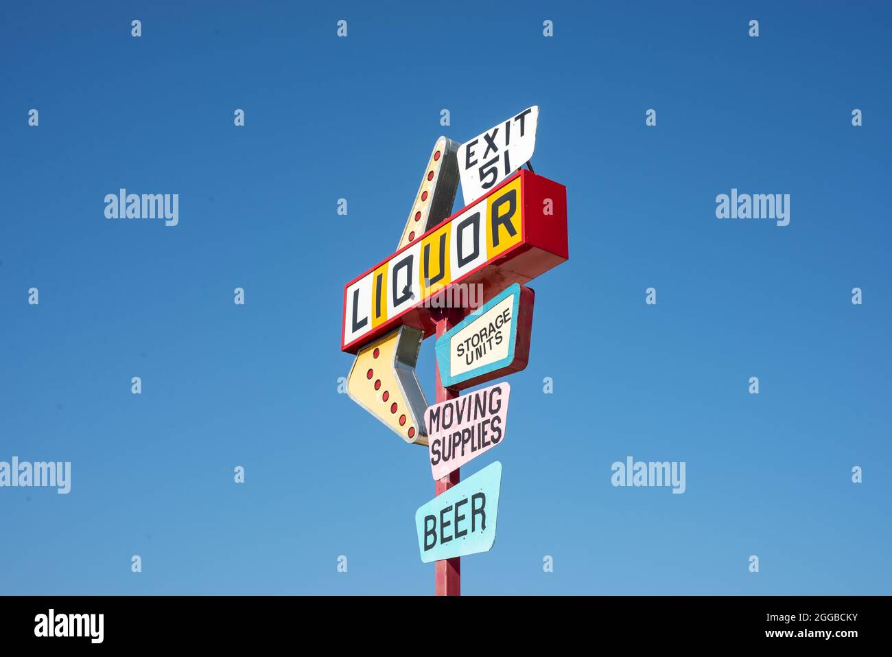 Vintage colorful retro roadside liquor sign Stock Photo - Alamy