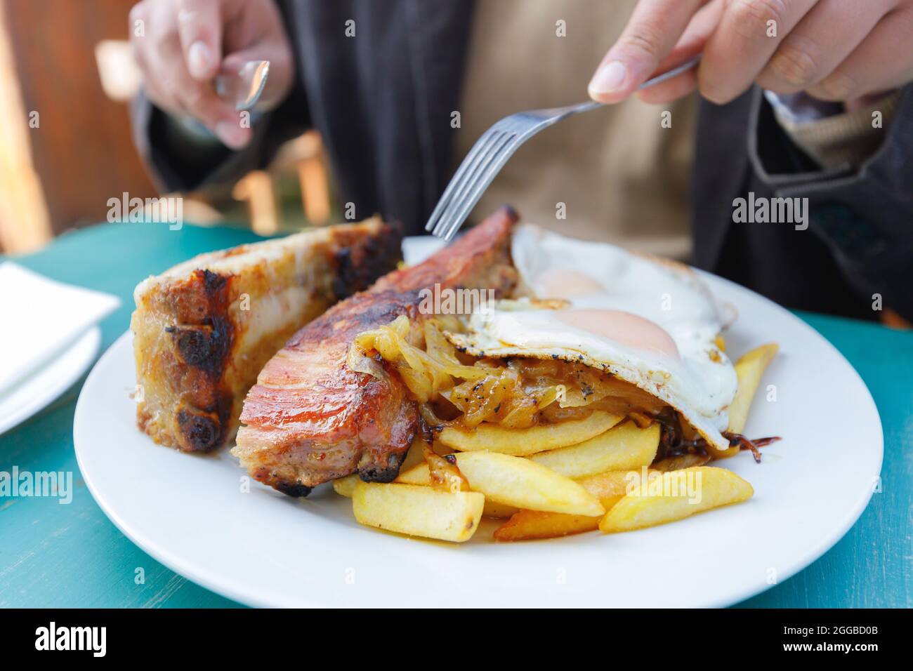 Man eating pork ribs hi-res stock photography and images - Alamy