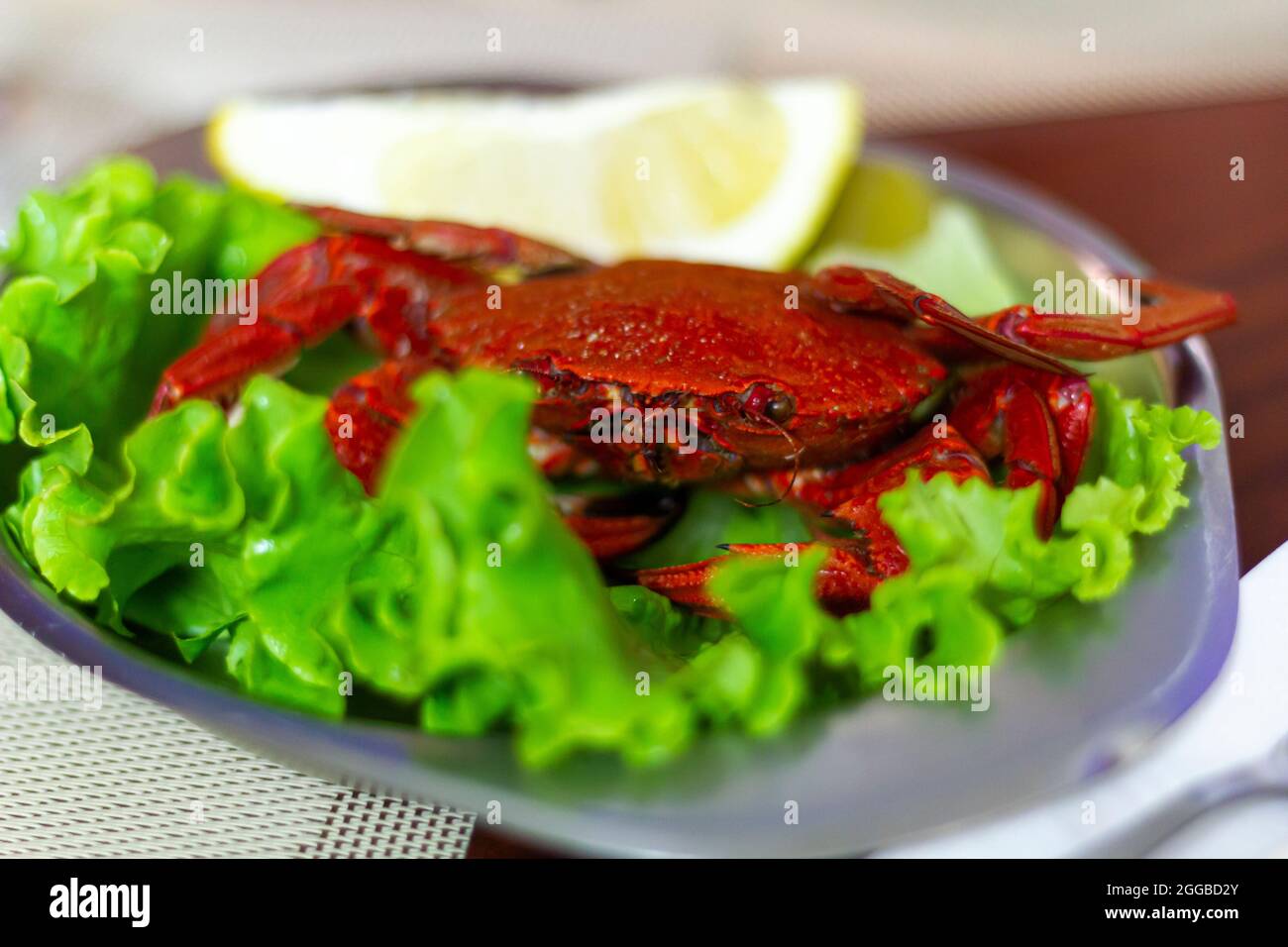 Plate with red crab ready to eat Stock Photo - Alamy