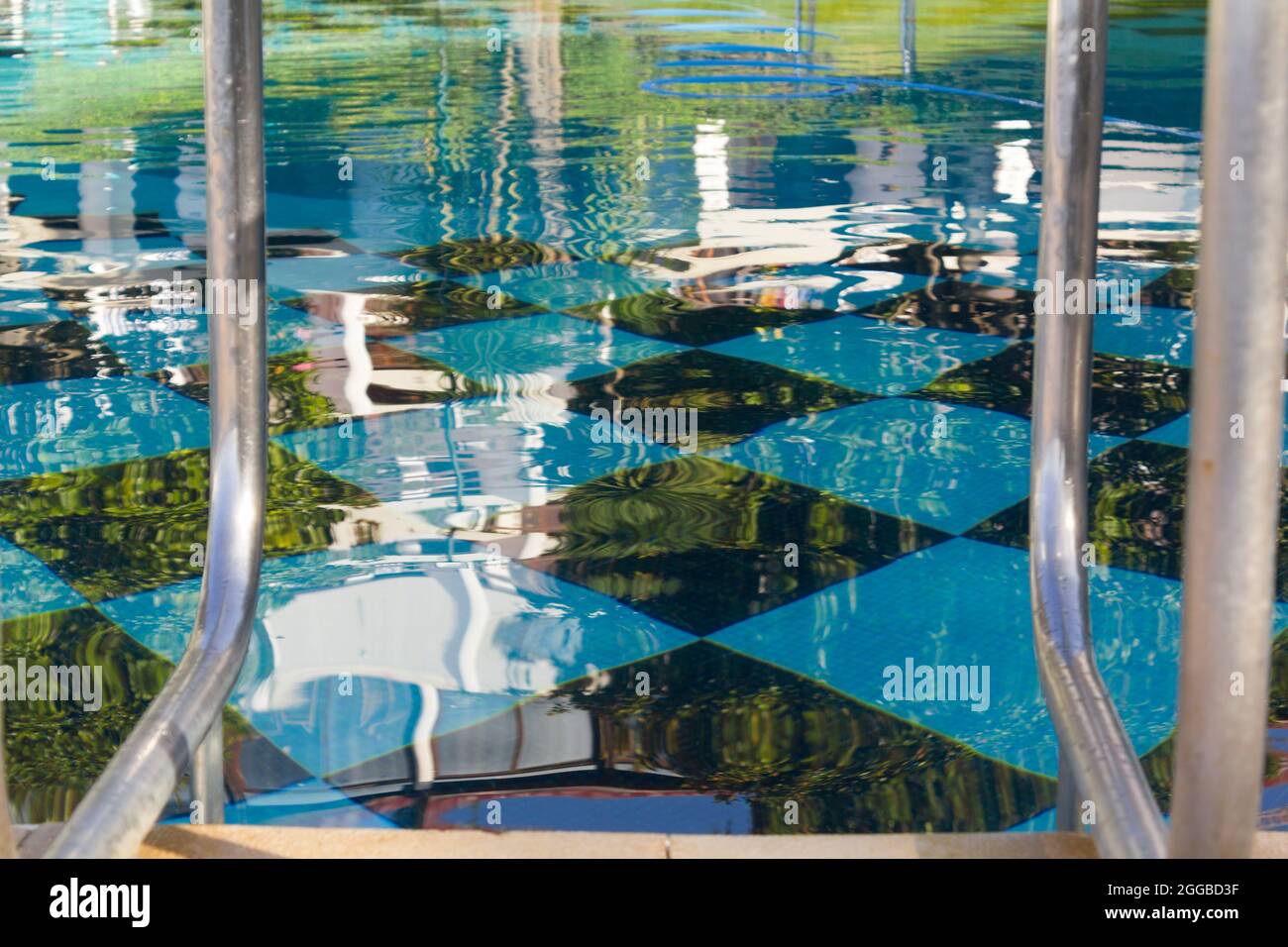 Swimming pool with diamond shaped tiles Stock Photo - Alamy