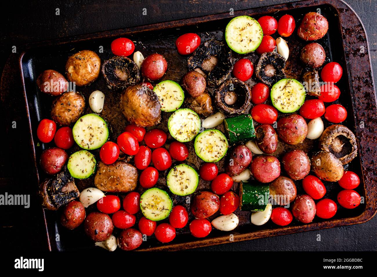 Uncooked Italian Vegetables Tossed in Olive Oil and Spices: Raw grape ...