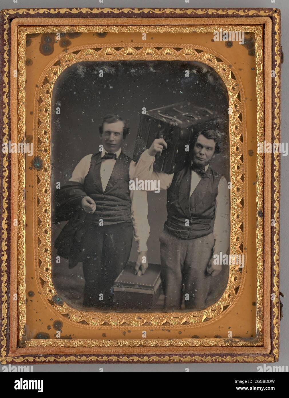 Untitled (Portrait of Two Standing Men Carrying Trunks), 1855. A work ...