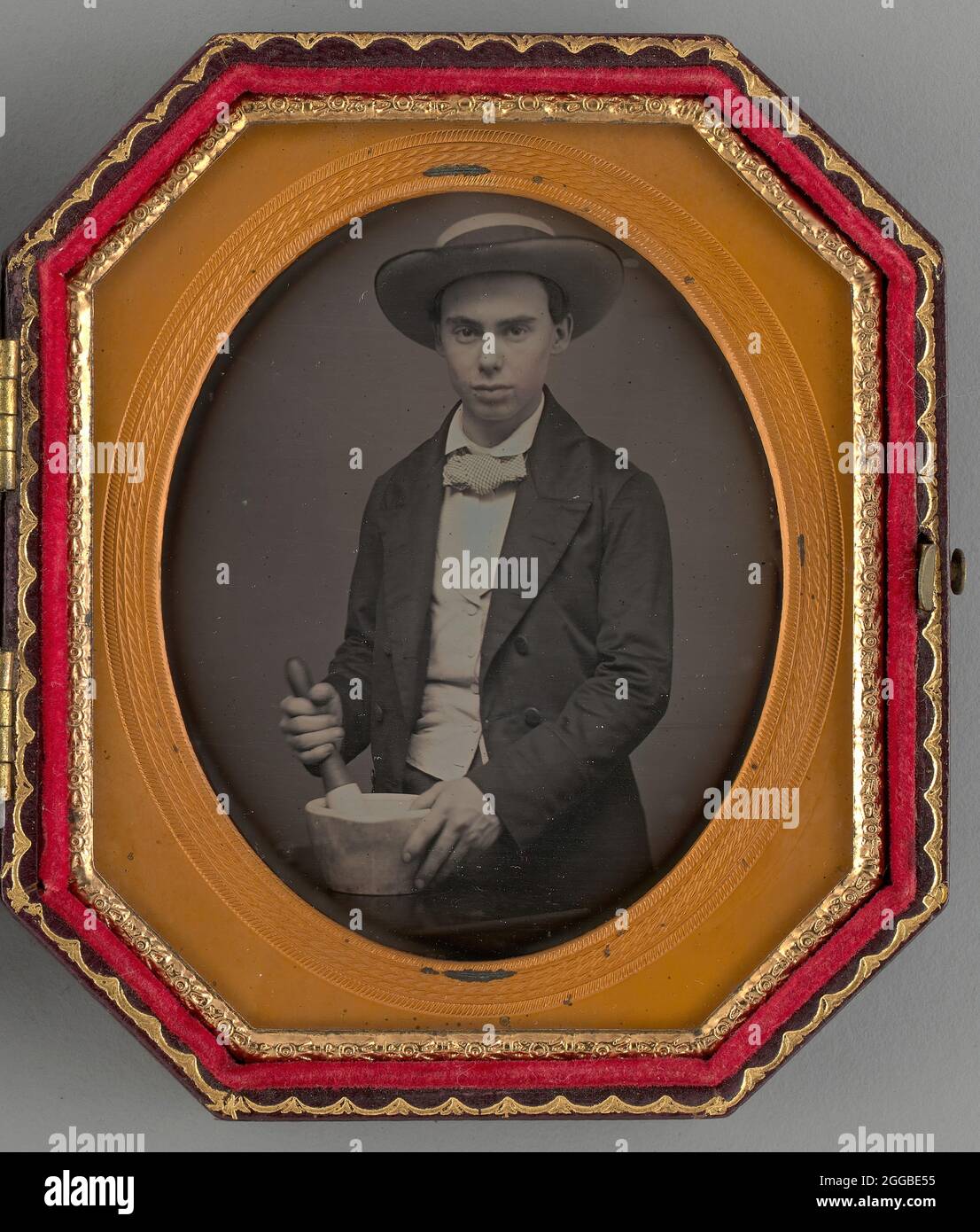 Untitled (Portrait of a Boy Holding a Mortar), 1858. A work made of ...