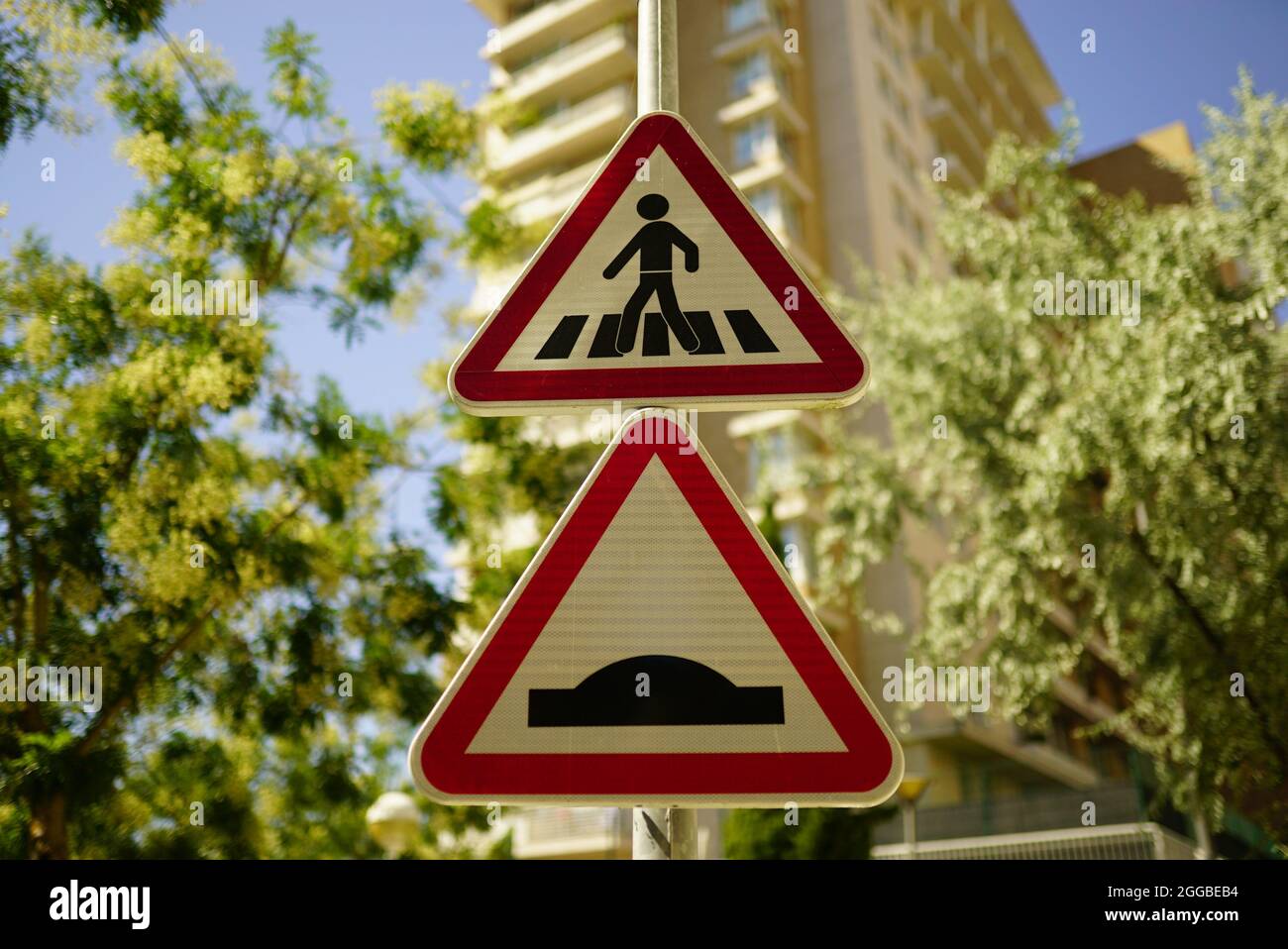 Closeup of a road sign with the blurred background Stock Photo - Alamy
