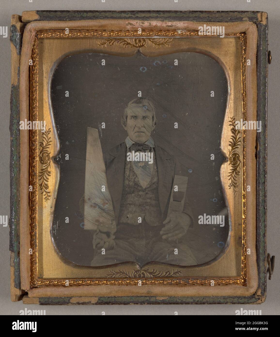 Untitled [portrait of a man holding carpentry tools], 1839/99 ...