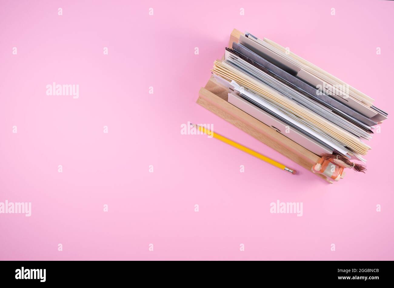 Close up of documents isolated on pink color background with free space ...