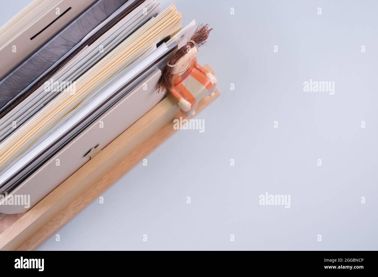 wood holder of files and documents isolated on gray background with ...